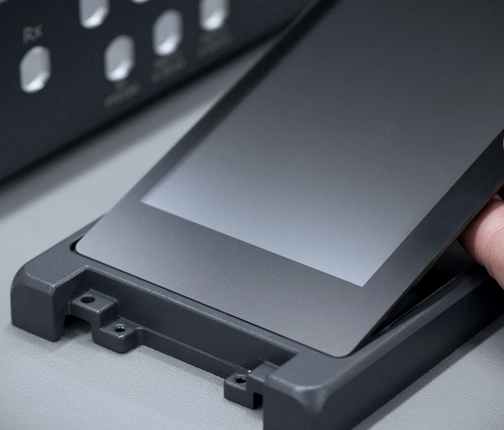 Assembly of enclosures and profiles